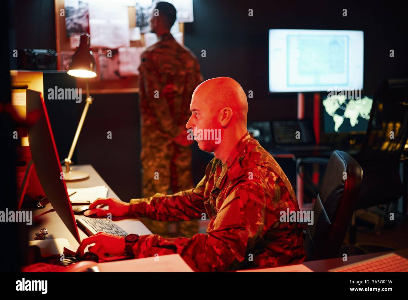 Analyzing Tactical Data in Military Command Center Stock Photo - Alamy