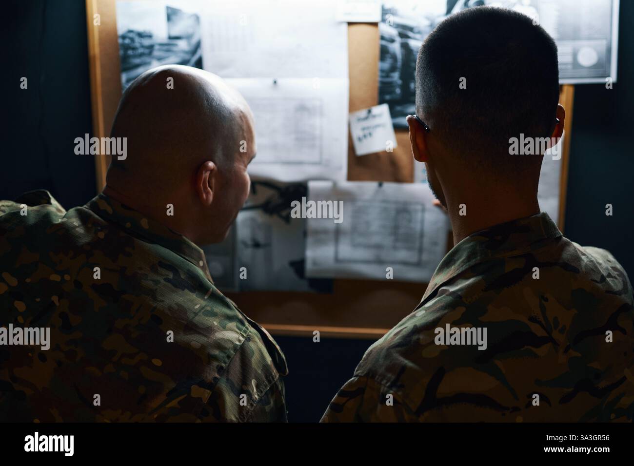 Collaborating During Tactical Military Planning Meeting Stock Photo - Alamy