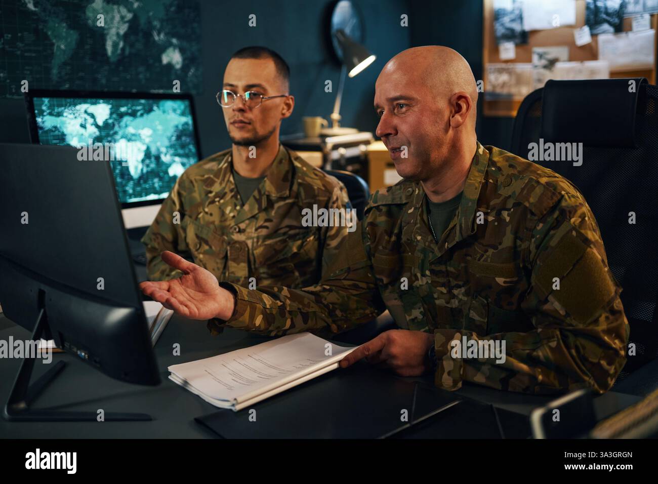 Discussing Military Strategy in Tactical Operations Room Stock Photo ...