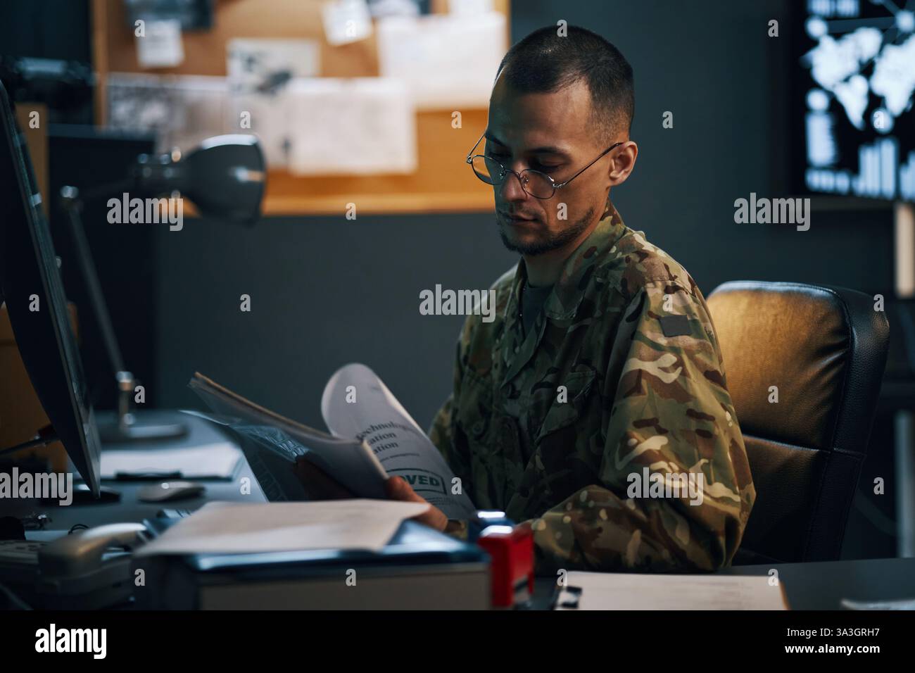 Dimly lit office setting hi-res stock photography and images - Alamy