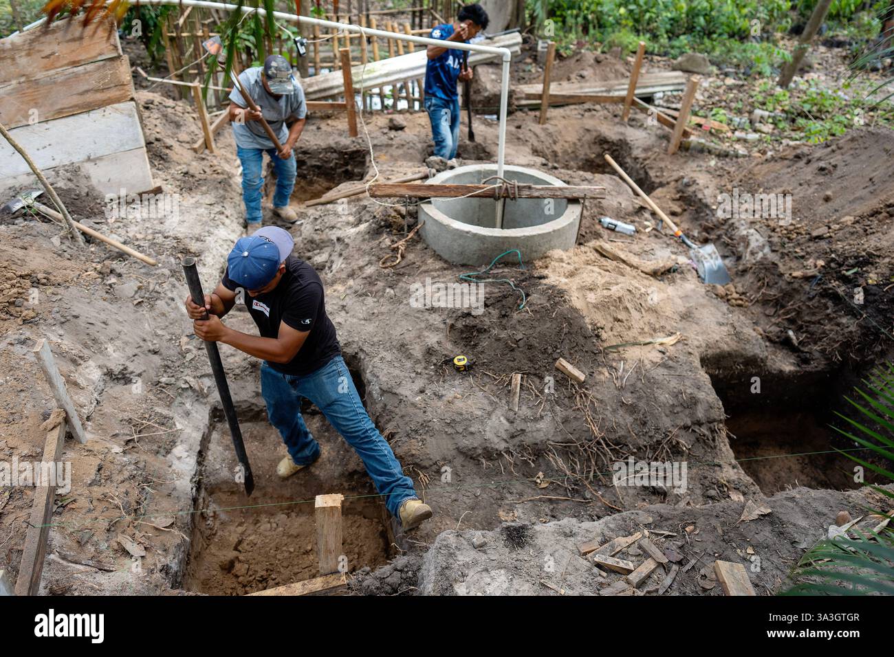 People work on an irrigation system at Qachuu Aloom (Mother Earth) in ...