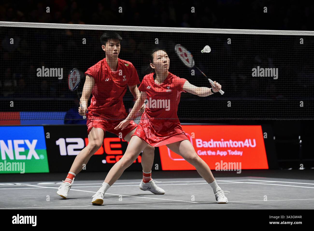 China's Wei Ya Xin, front, and Feng Yan Zhe play against China's Chen Fang Hui and Guo Xin Wa ...