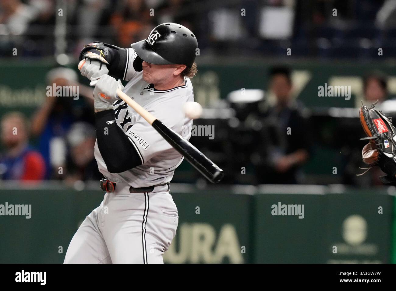 Yomiuri Giants' Trey Cabbage strikes out in the second inning of an MLB ...