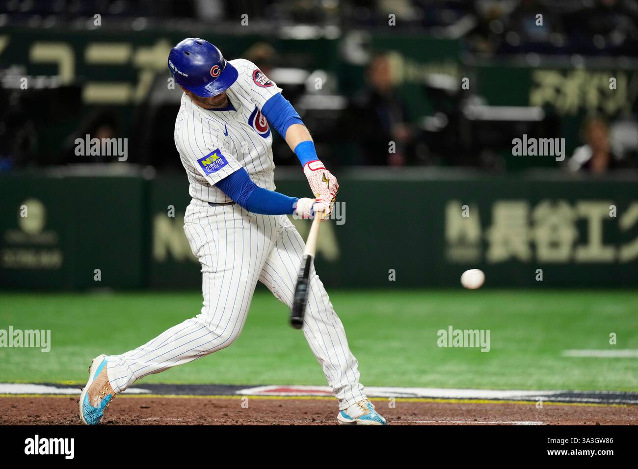 Chicago Cubs' Ian Happ singles in the fifth inning of an MLB Japan ...
