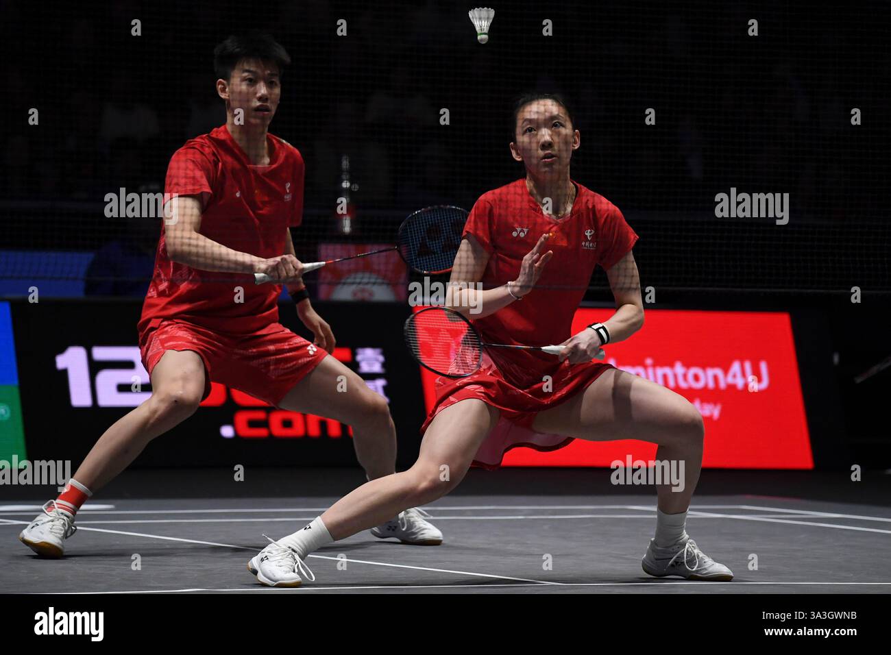China's Wei Ya Xin, front, and Feng Yan Zhe play against China's Chen Fang Hui and Guo Xin Wa ...