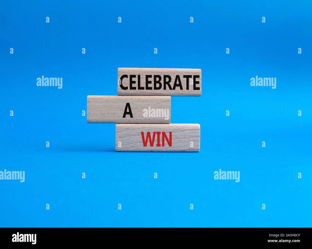Celebrate a win symbol. Concept words Celebrate a win on wooden blocks ...