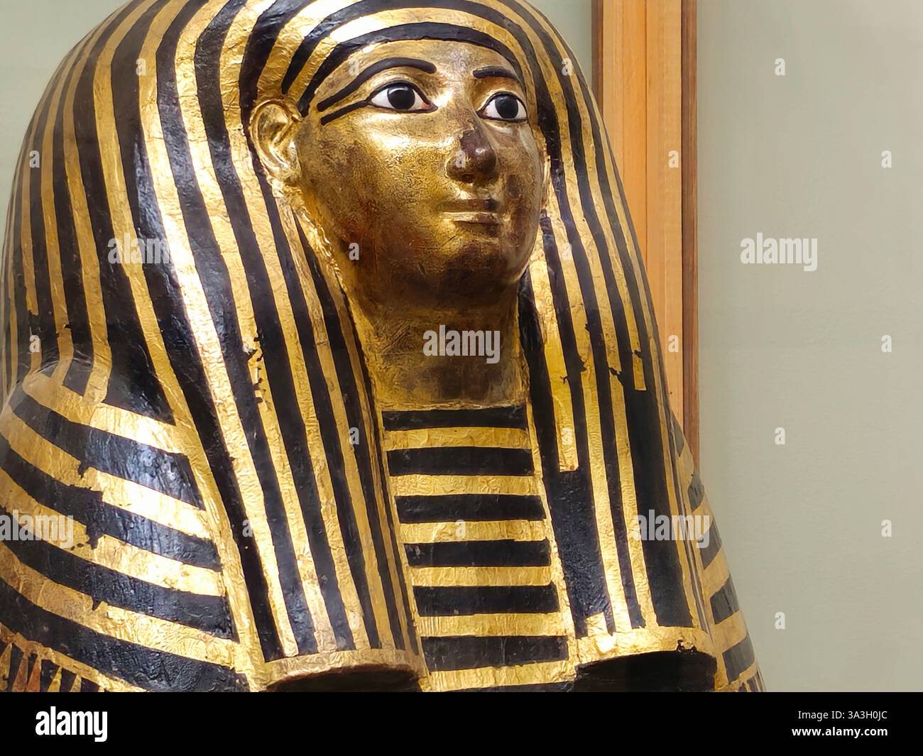 Cairo, Egypt, February 1 2025: Golden mask collection inside the ...