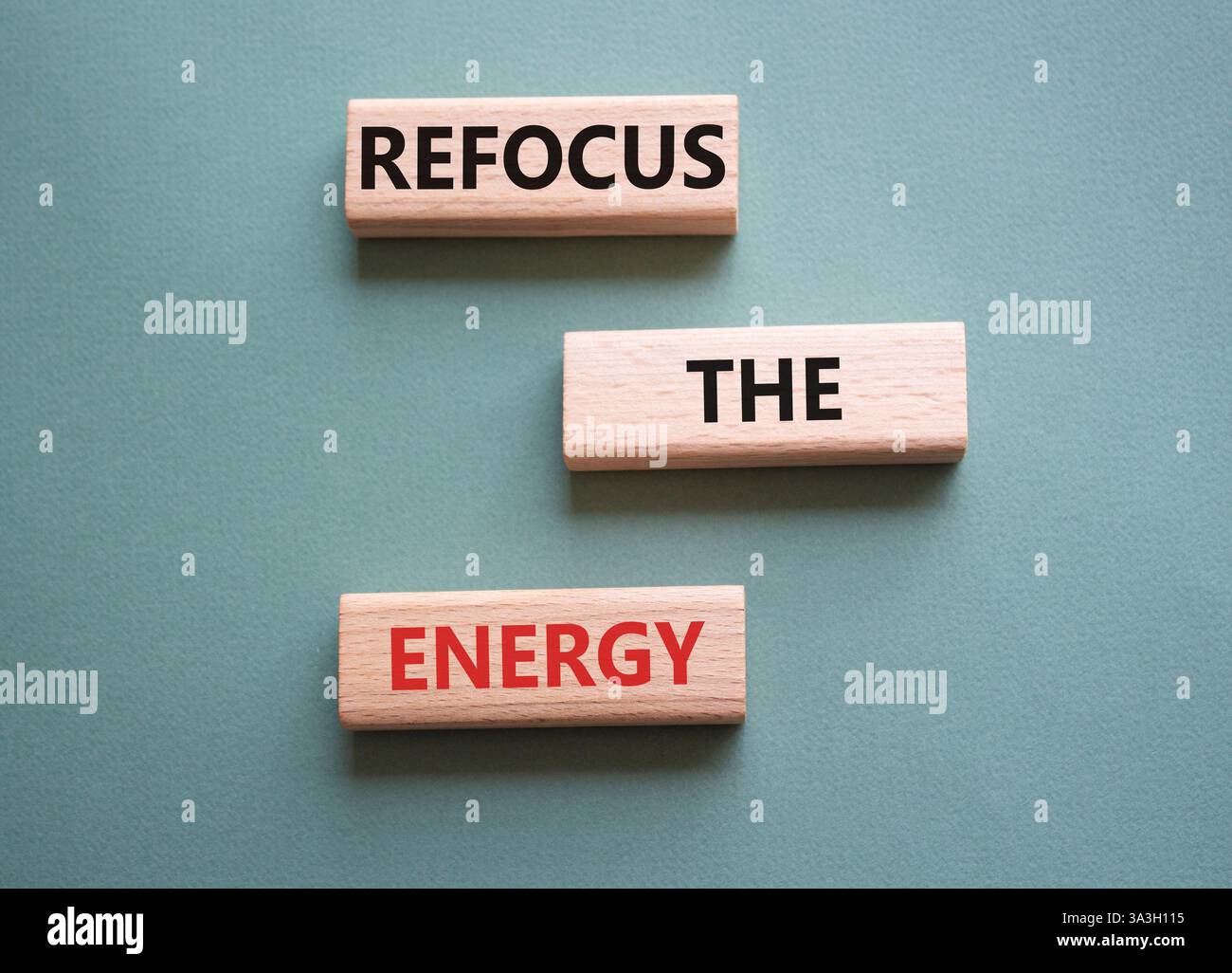Refocus the Energy symbol. Concept word Refocus the Energy on wooden ...