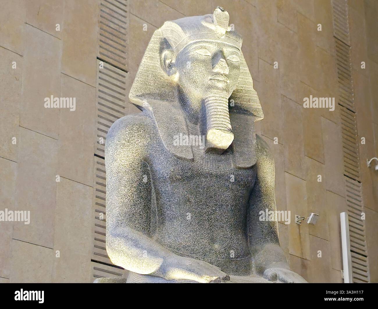 Giza, Egypt, February 22 2025: The seated statue of King Amenhotep III ...