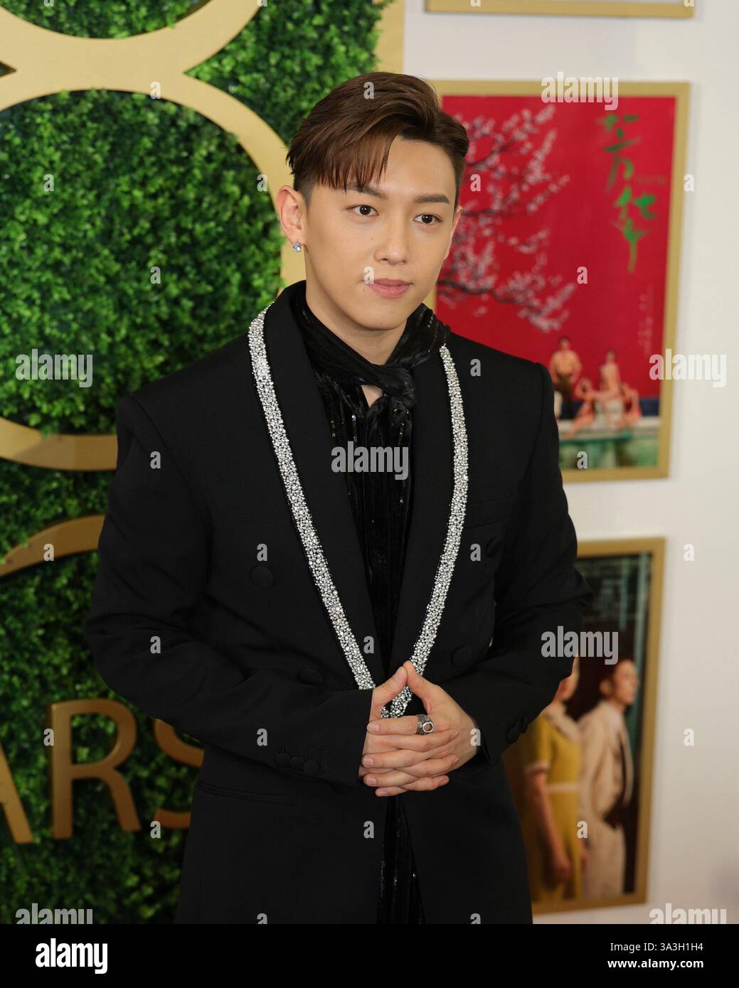 Cheung Tin Fu arrives for the 18th Asian Film Awards ceremony, at the ...