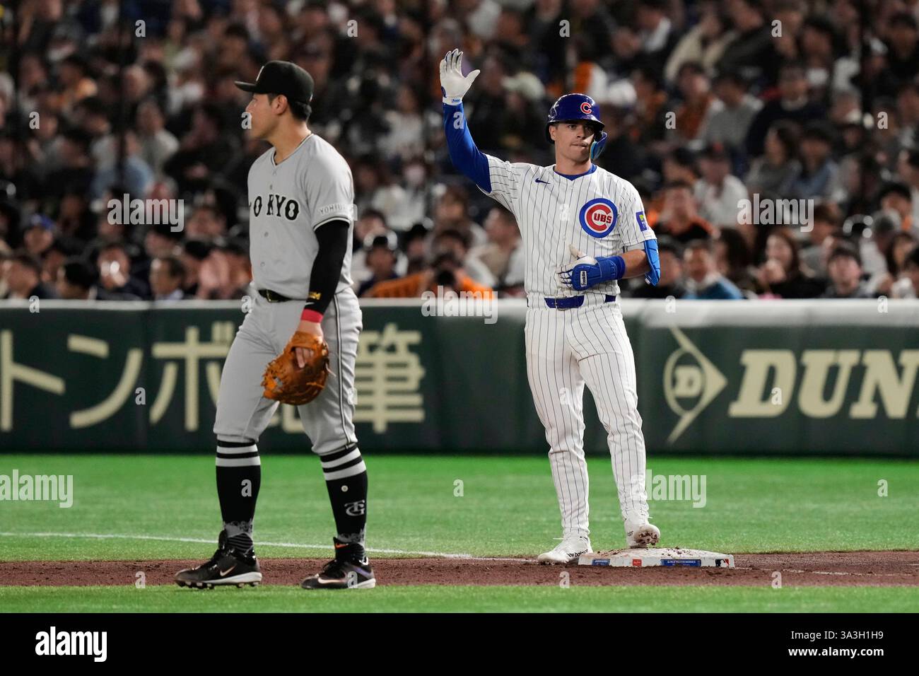 Chicago Cubs' Matt Shaw, right, celebrates his two-run single as ...