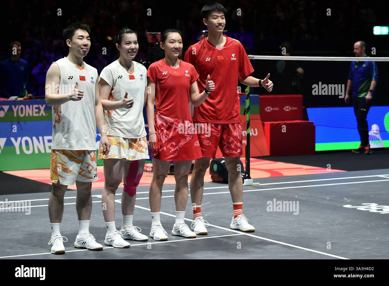 China's Guo Xin Wa, left, and his partner Chen Fang Hui, second left ...