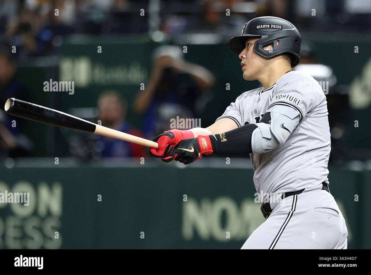 Yomiuri Giants' Kazuma Okamoto hits a two-run double in the fifth ...