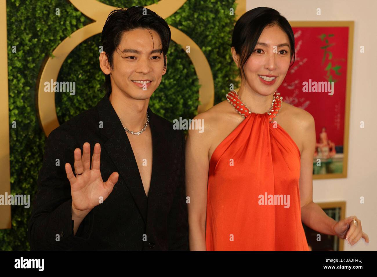 Cheryl Yang, right and Austin Lin arrive for the 18th Asian Film Awards ...