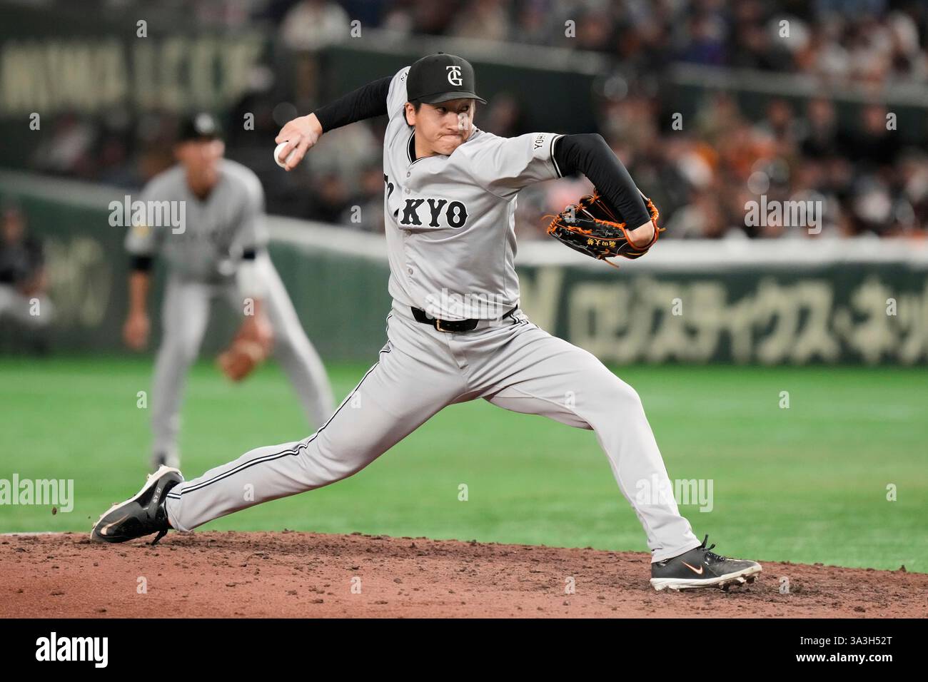 Yomiuri Giants pitcher Taisei Ota throws to the Chicago Cubs in the ...