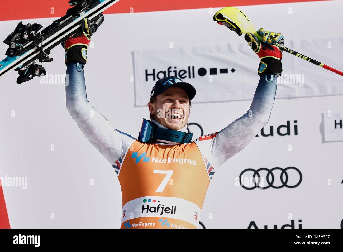 Norway's Atle Lie McGrath celebrates on the podium after taking second ...