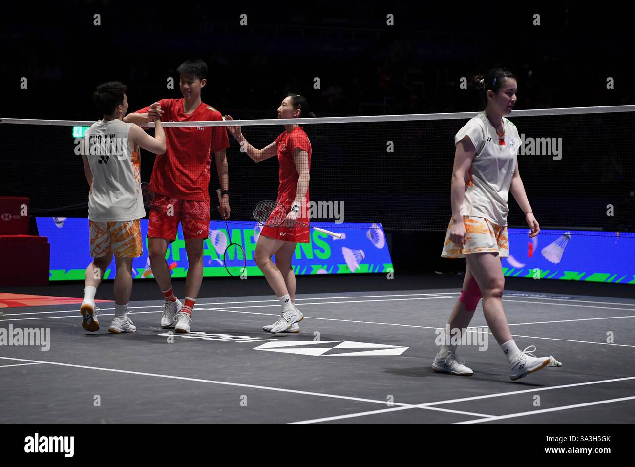 China's Feng Yan Zhe, second left, and his partner Wei Ya Xin greet ...