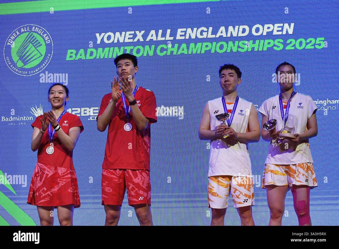 China's Wei Ya Xin, left, and her partner Feng Yan Zhe, second left ...