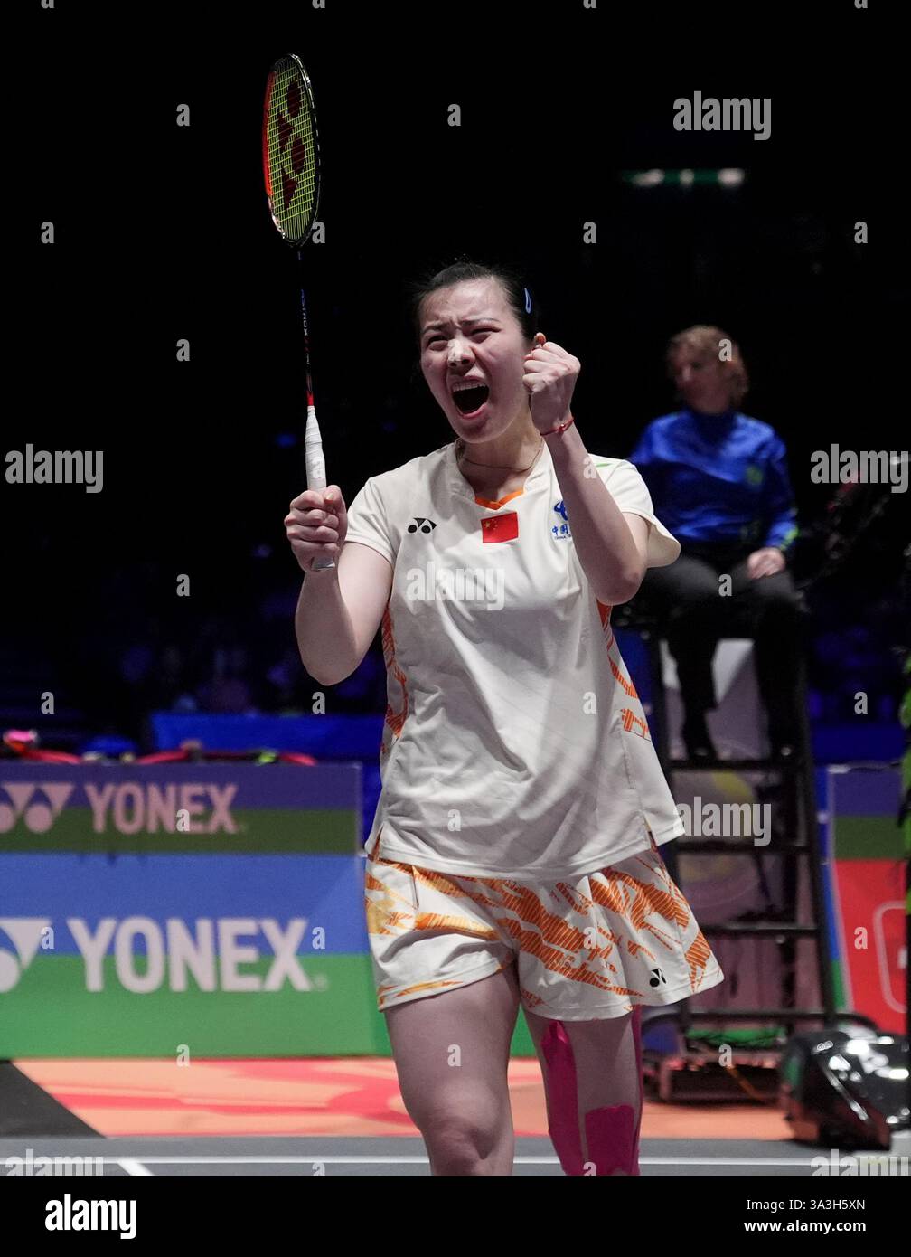 China's Fang Hui Chen celebrates winning the mixed doubles final with ...