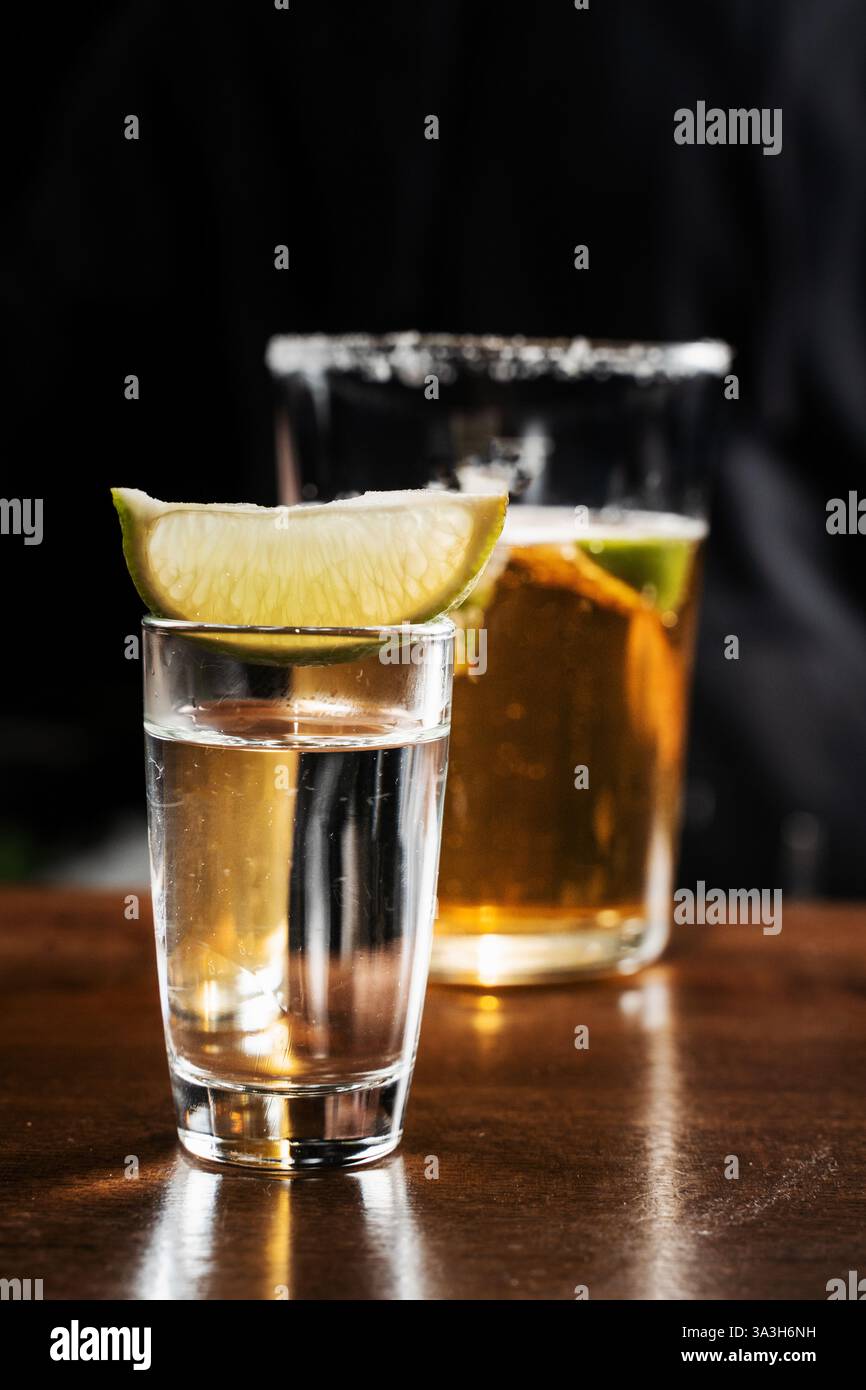 Shot of tequila with lime and beer ingredients of alcoholic cocktail ...