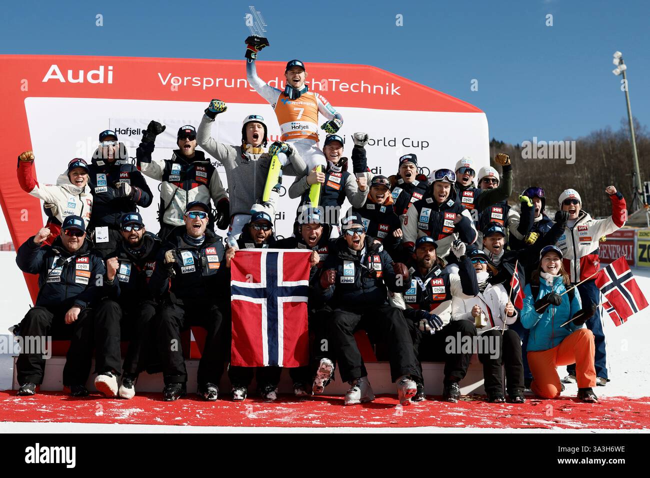 Norway's Atle Lie McGrath, center, celebrates with the team after ...
