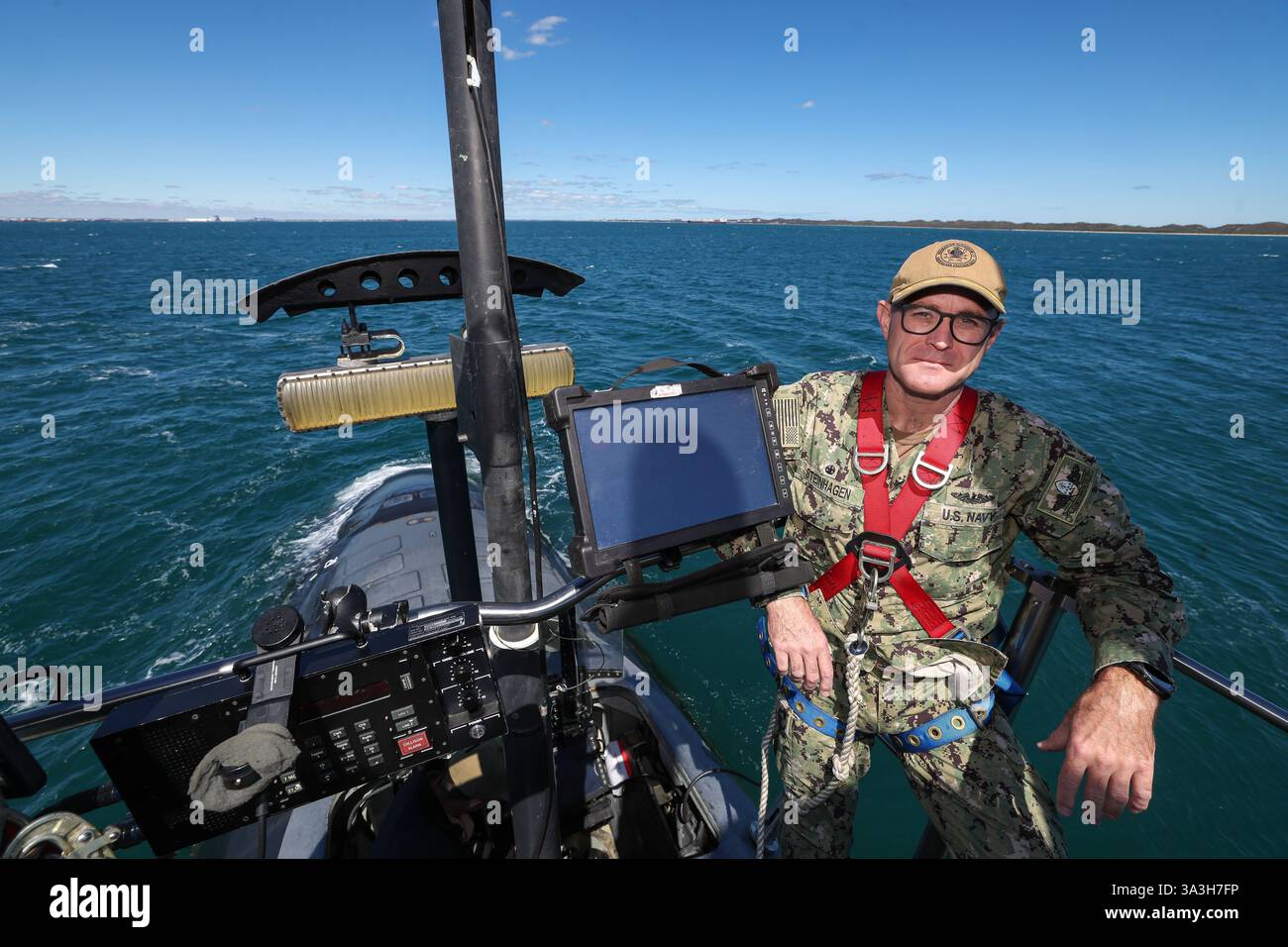 Captain Neil Stein Hagen Submarine Squadron 15 Commodore on the bridge ...
