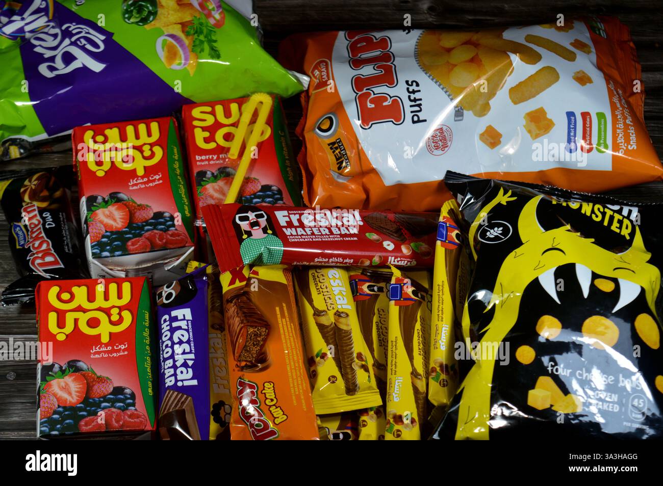 Cairo, Egypt, February 1 2025: assorted biscuits, chocolate, juice ...