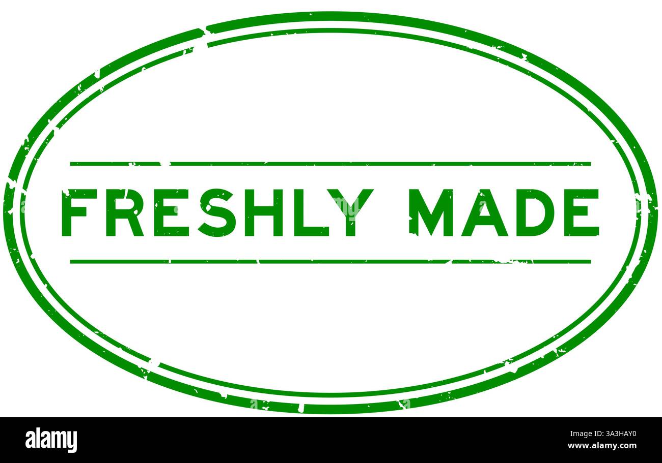 Grunge green freshly made word oval rubber seal stamp on white ...