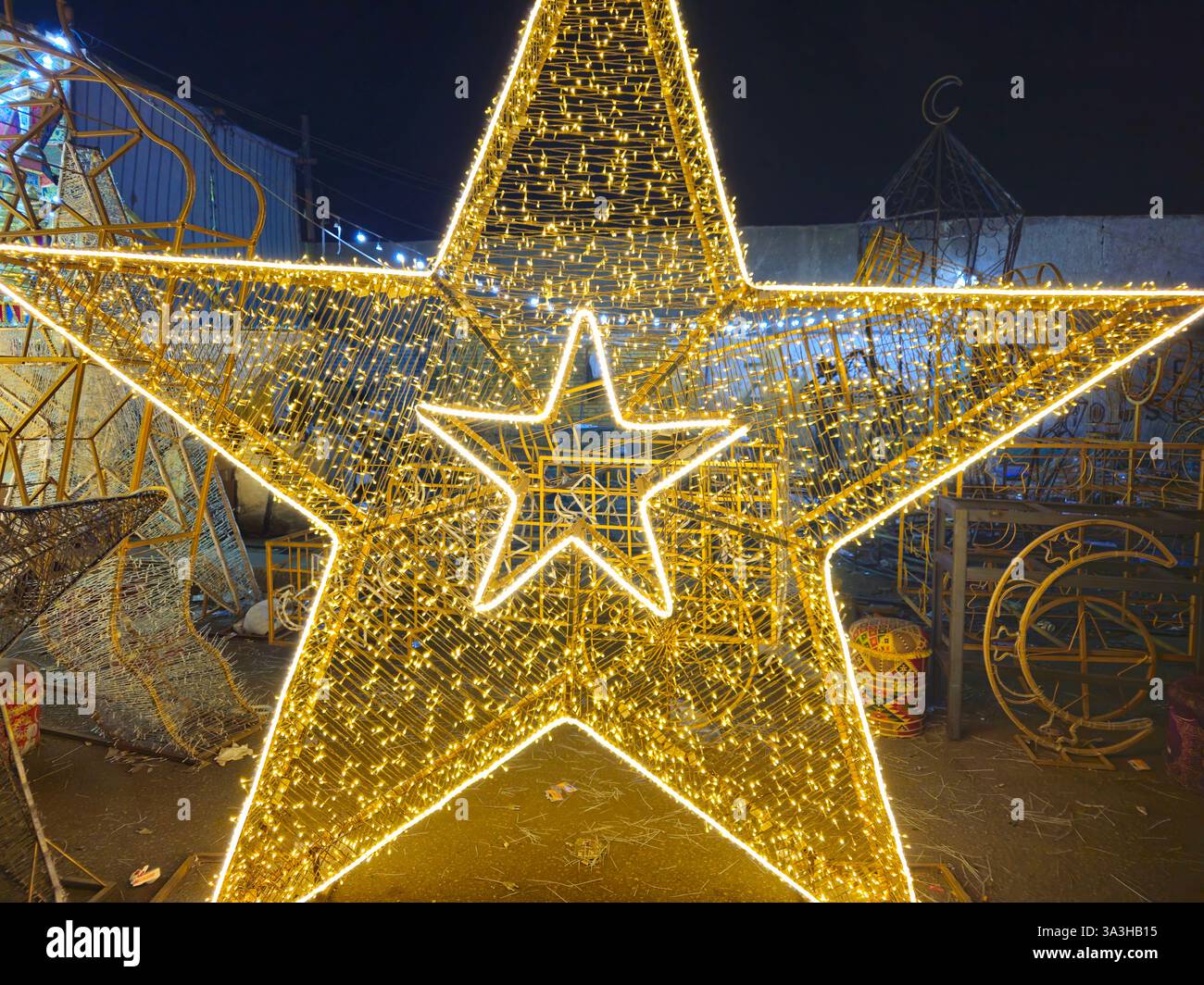 Cairo, Egypt, February 11 2025: star shape with lights as a festive decorations of Islamic ...