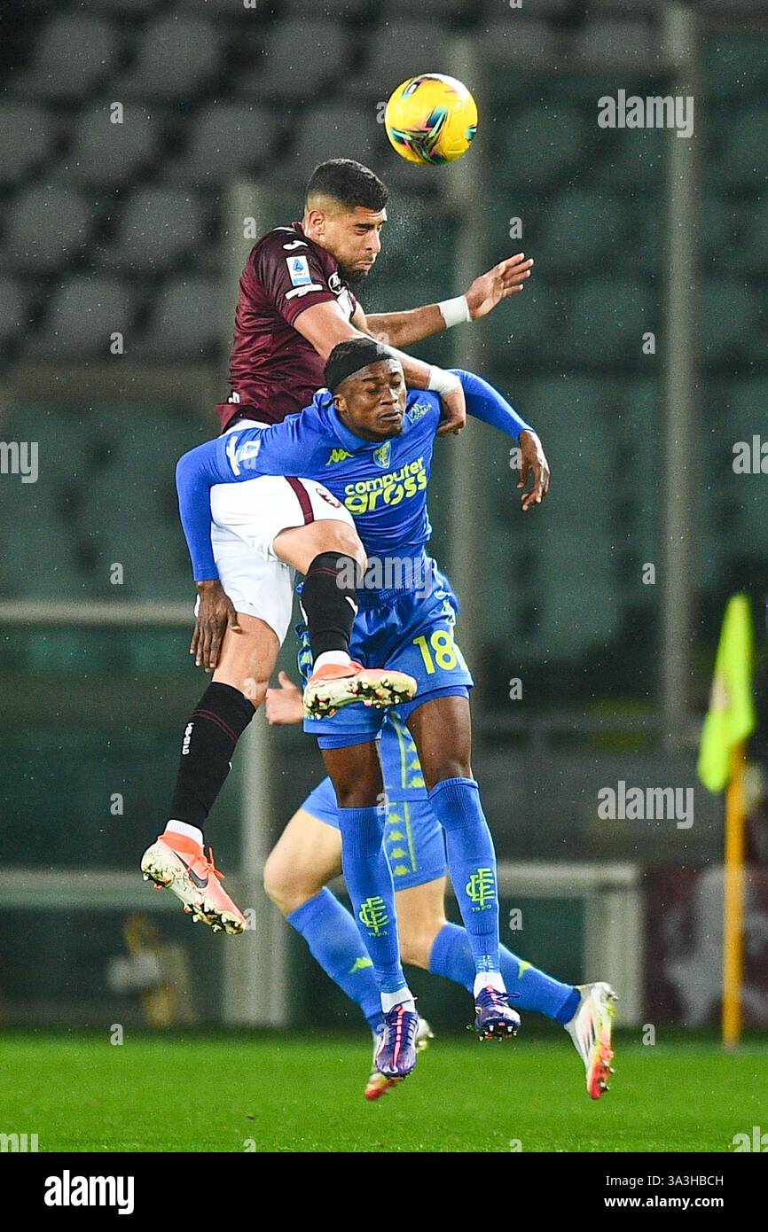 Torino's Adam Masina battles for the ball with Empoli’s Christian ...