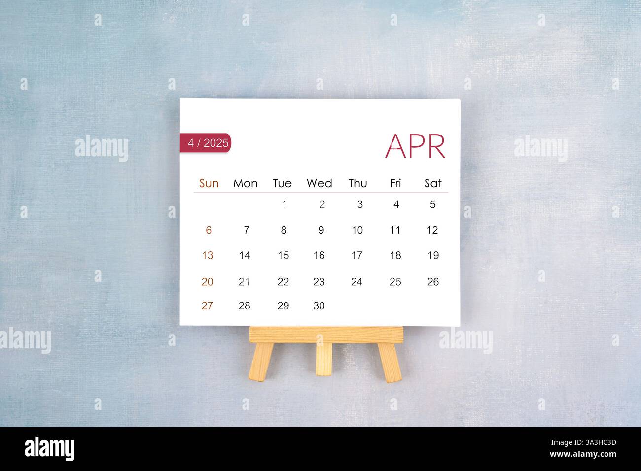 April 2025 calendar page with wooden easel, Flat lay Stock Photo - Alamy