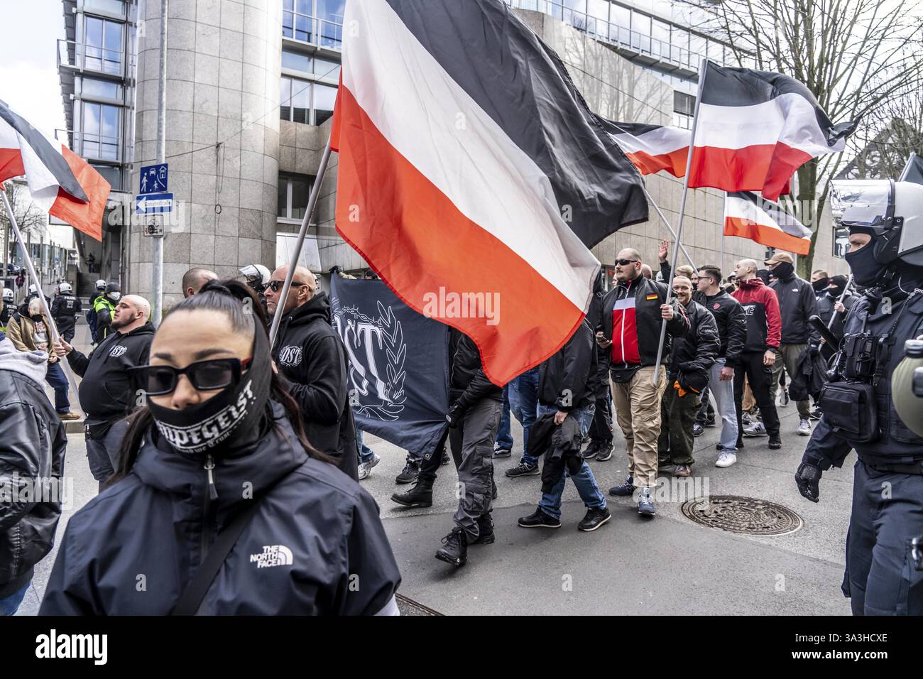The neo-Nazi group Jung und Stark, JS, demonstrates in the city centre ...