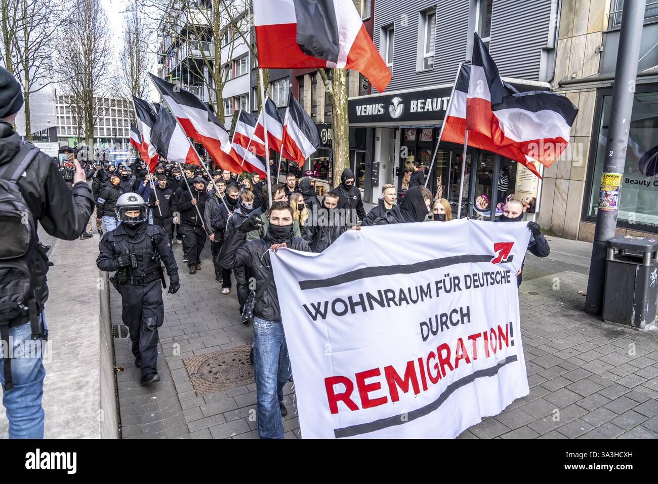 The neo-Nazi group Jung und Stark, JS, demonstrates in the city centre ...