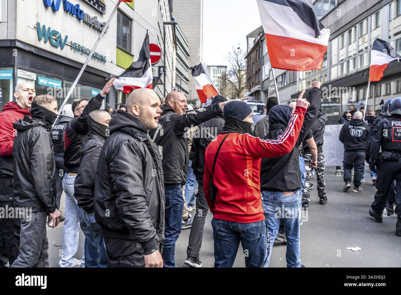 The neo-Nazi group Jung und Stark, JS, demonstrates in the city centre ...