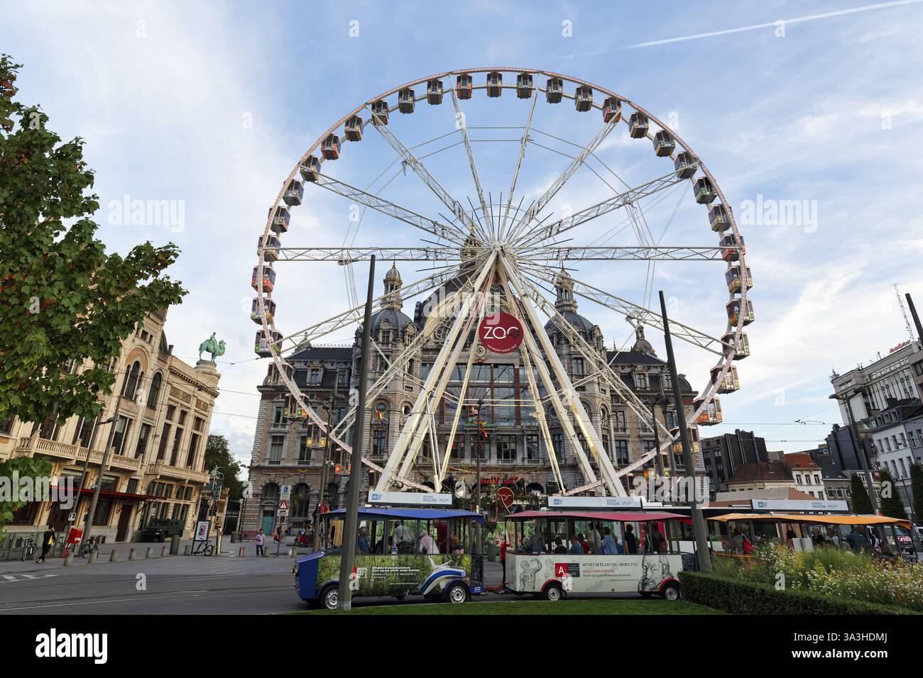 Tourist tram Touristram in front of Ferris wheel, city tour, historic ...