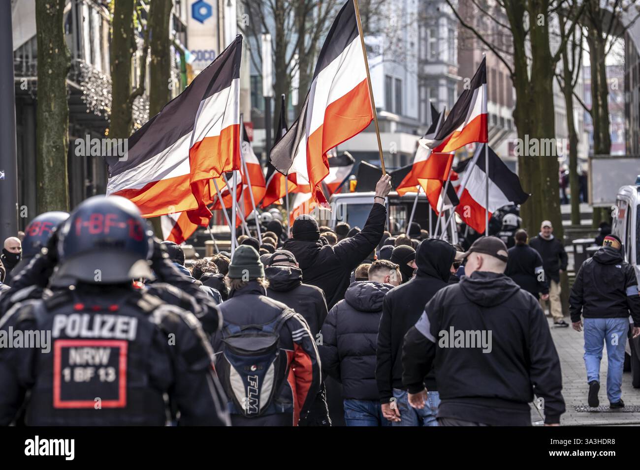 The neo-Nazi group Jung und Stark, JS, demonstrates in the city centre ...