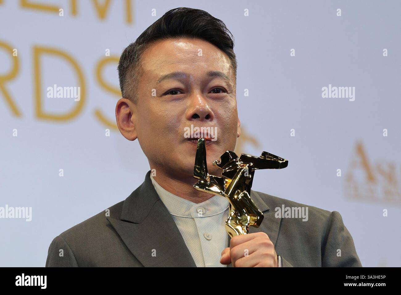 Lee Kang-Sheng, winner of Best Supporting Actor for the movie Stranger ...