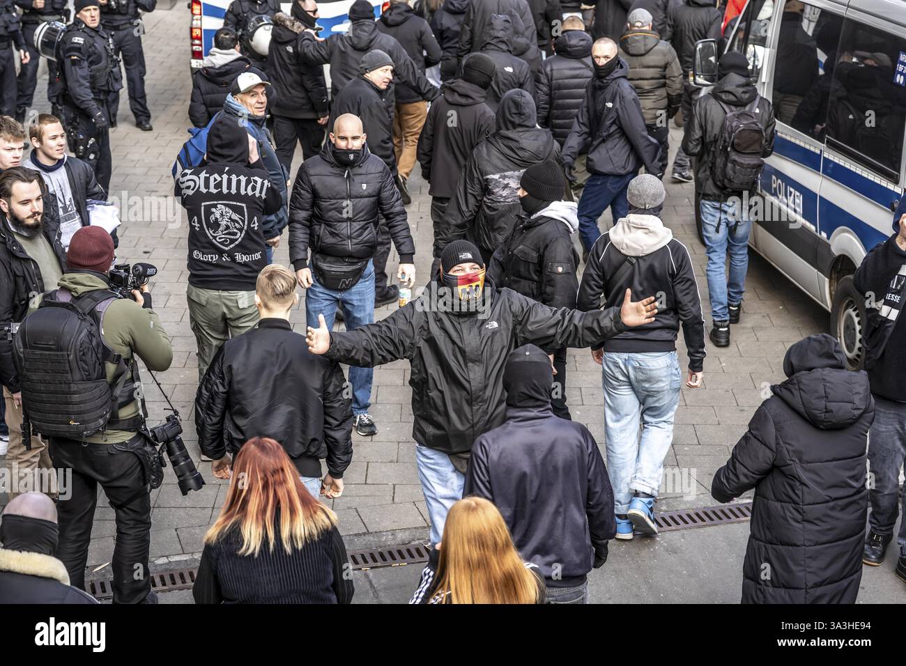 The neo-Nazi group Jung und Stark, JS, demonstrates in the city centre ...