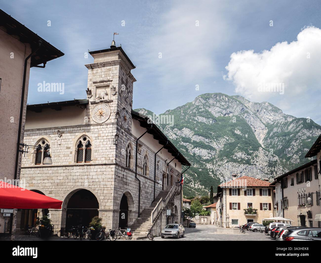 The historic town hall of Venzone, Italy, with its stone facade and ...