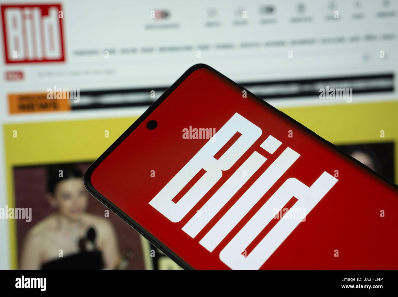 The logo of the German newspaper Bild is displayed on a smartphone ...