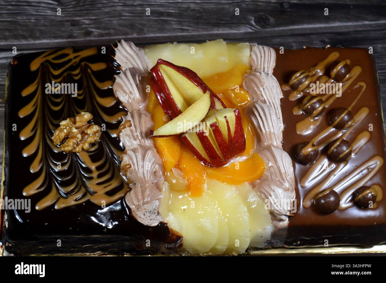 rectangular shaped birthday cake of 3 parts of different pieces sponge ...