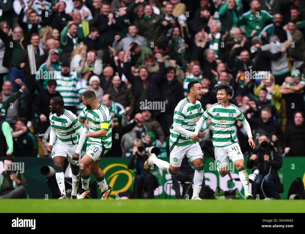 Celtic's Reo Hatate celebrates scoring their side's second goal of the ...
