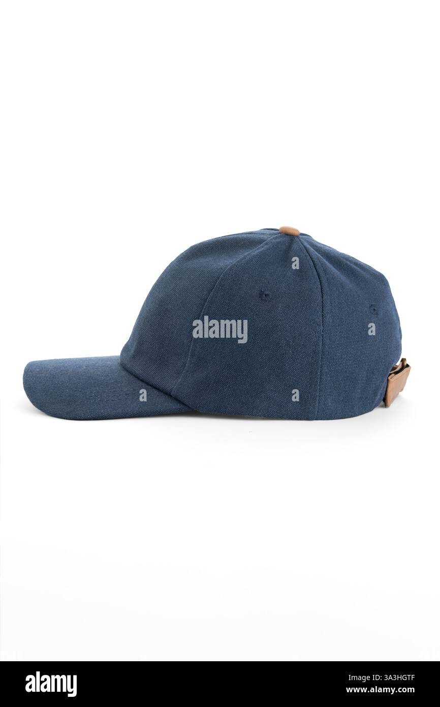 Blue textile baseball cap with brown elements, left side view, on white ...