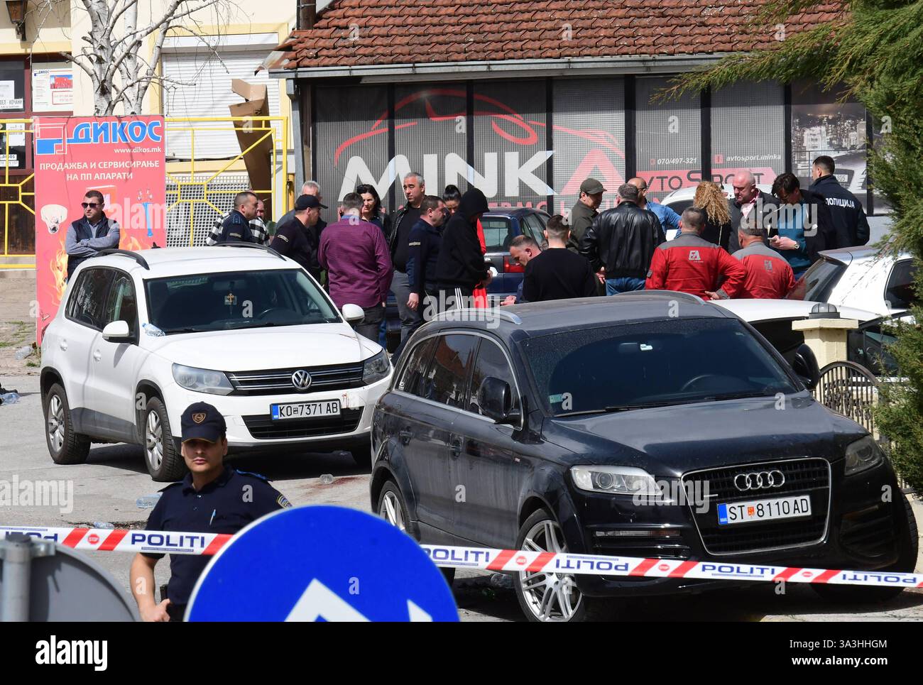 Police, investigators and firefighters are seen in front of night club ...