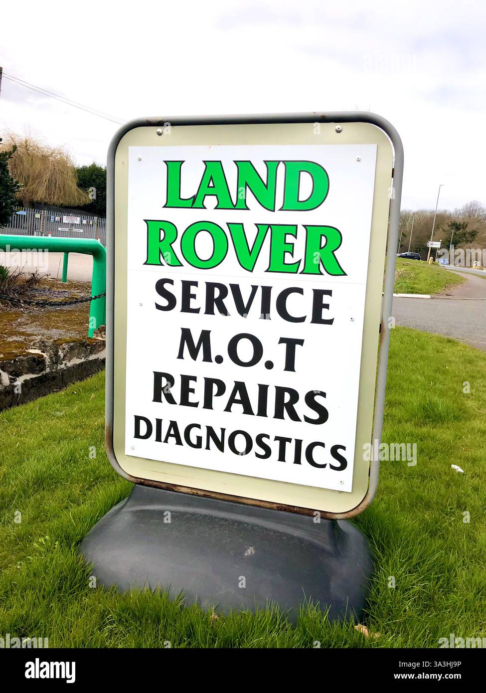 A Land Rover servicing and repairs sign outside a garage in the U.K ...