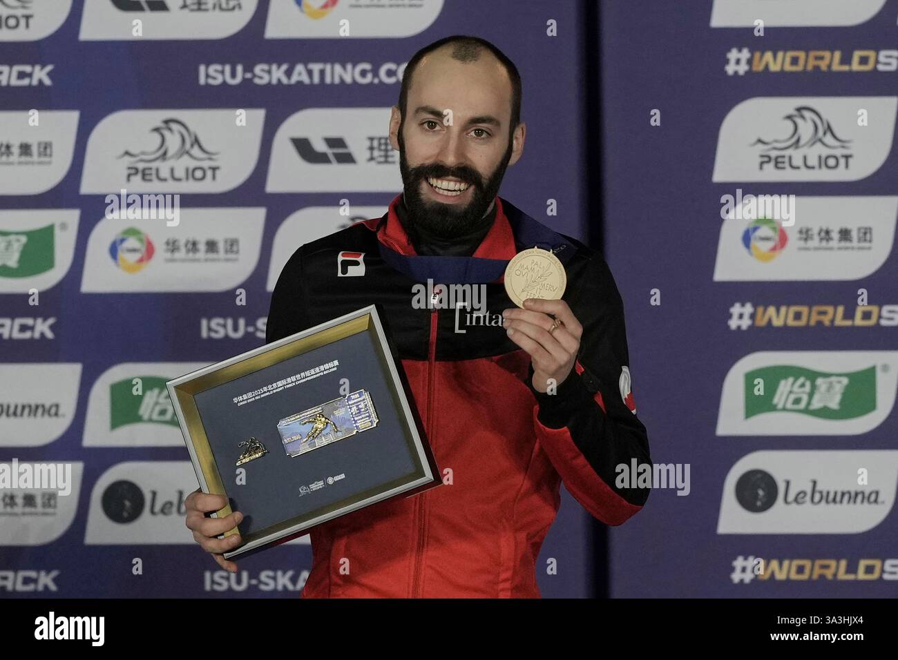 Gold medalist Steven Dubois of Canada poses on podium during the award ...