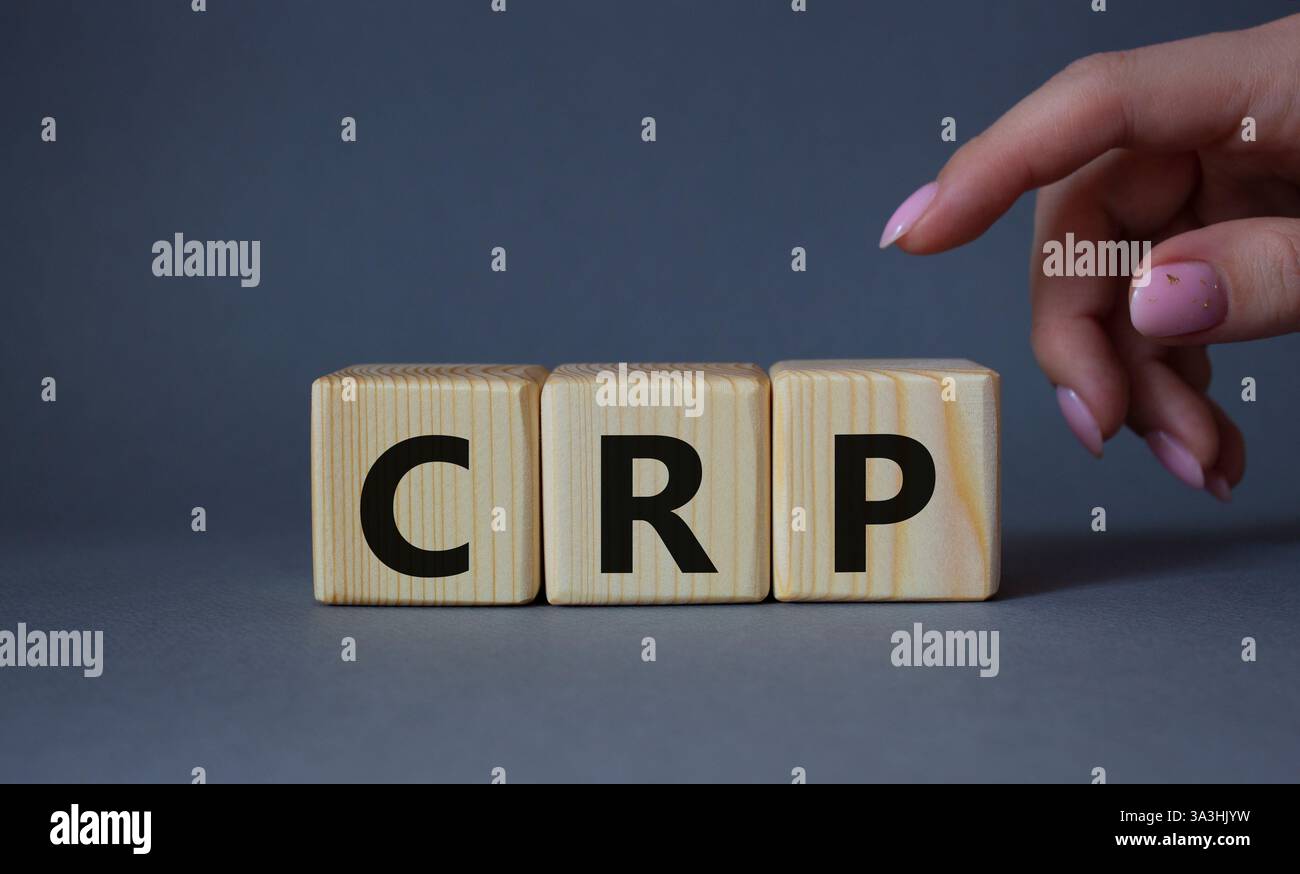 CRP - C-Reactive Protein Test symbol. Wooden cubes with word CRP ...