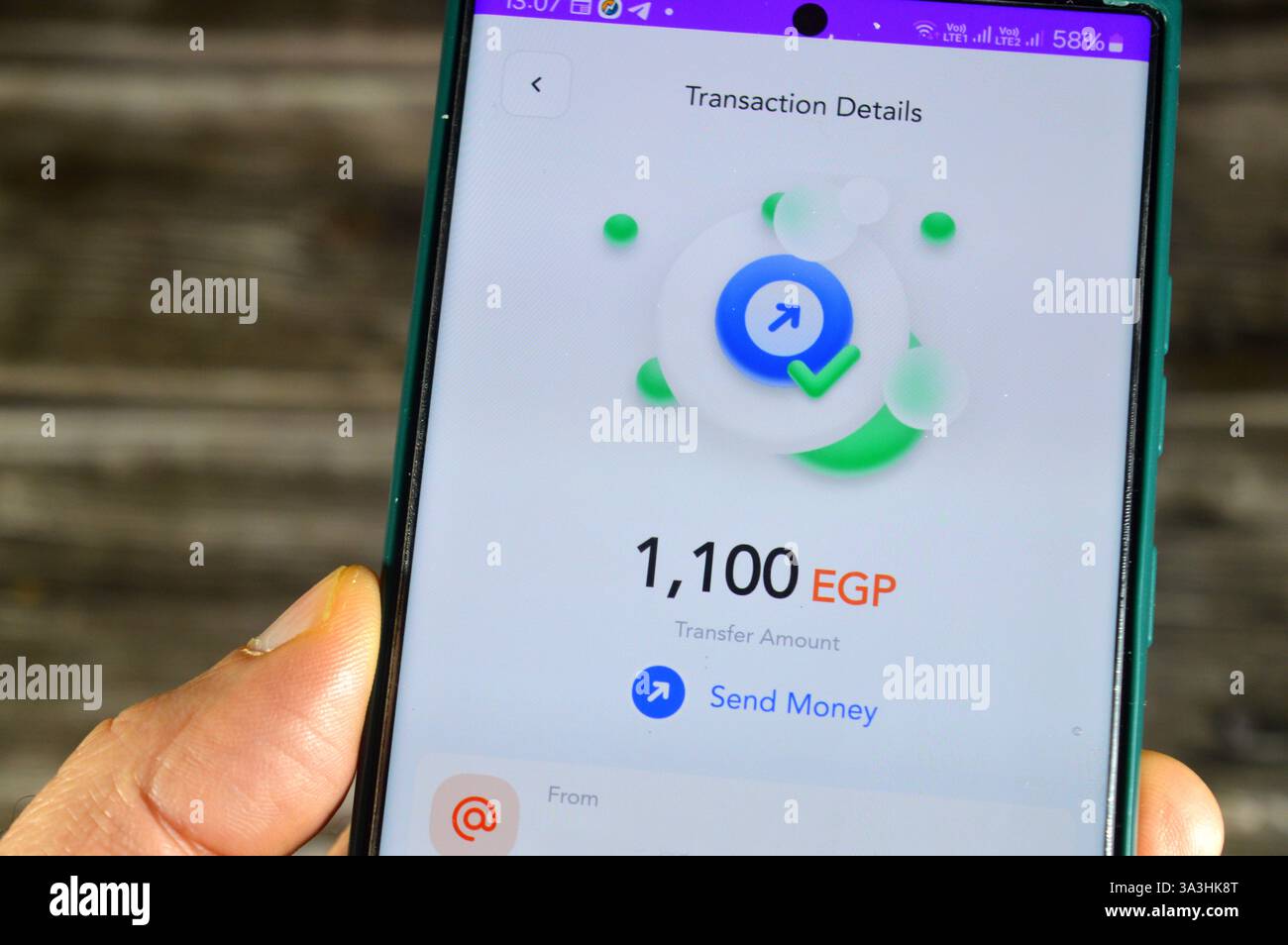 Cairo, Egypt, February 6 2025: Successful money transfer transaction on ...