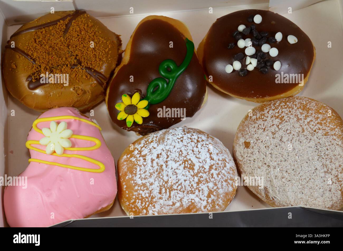 Assorted round and heart shaped donuts, glazed, yeast raised, American ...