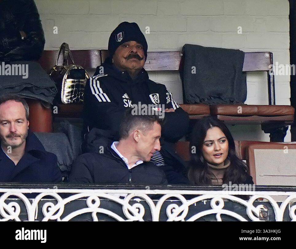 Fulham owner Shahid Khan watches the action during the Premier League ...